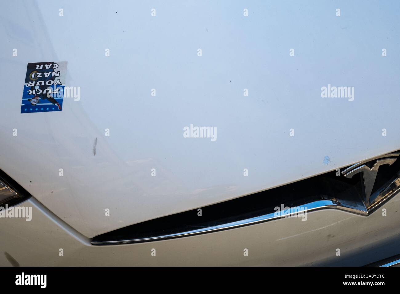 Seattle, USA. 5th Mar 2025. Anti - Elon Musk stickers seen on a Tesla ...