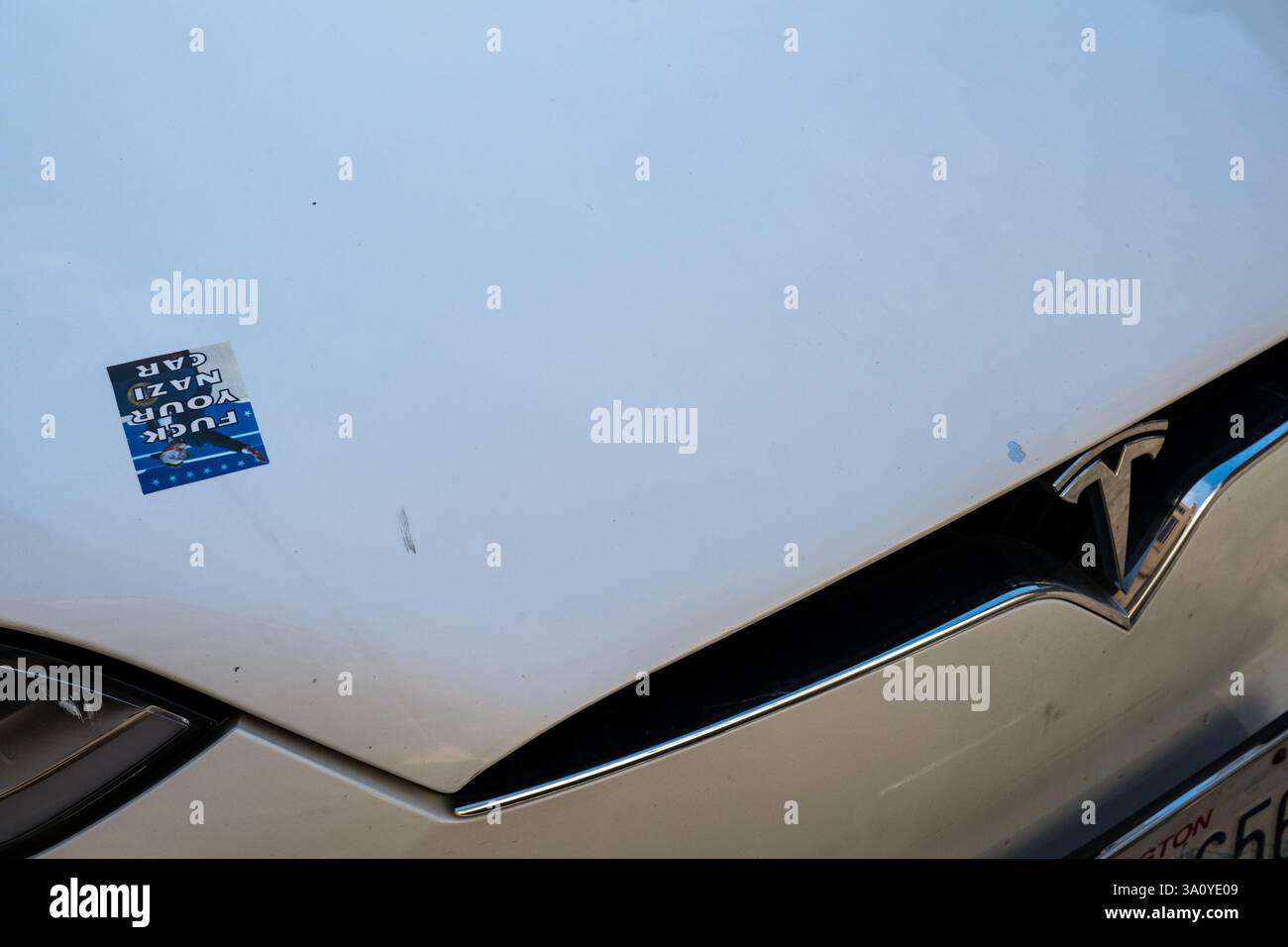 Seattle, USA. 5th Mar 2025. Anti - Elon Musk stickers seen on a Tesla ...