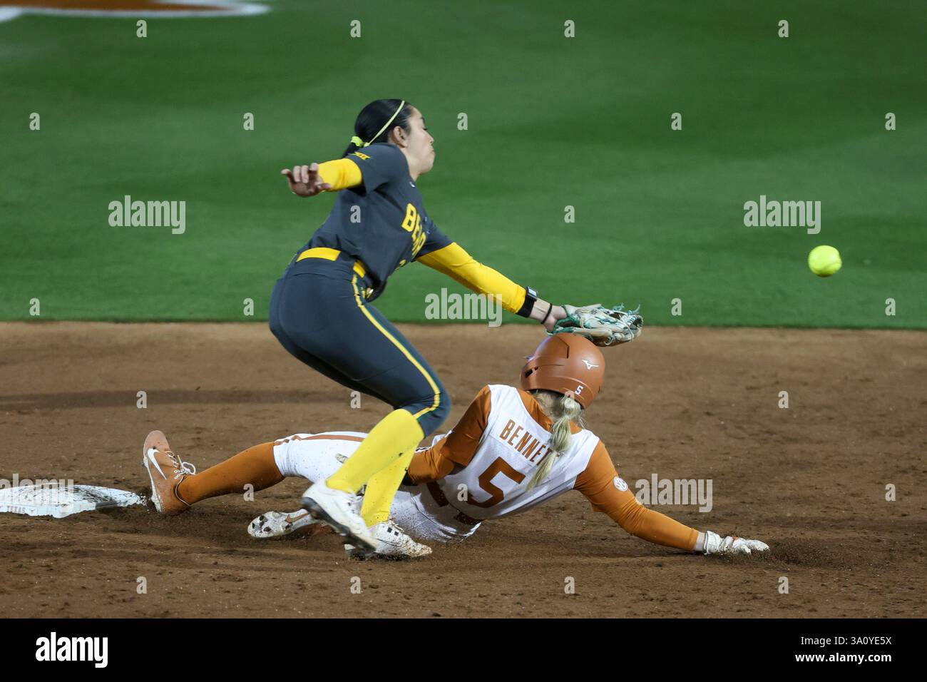 AUSTIN, TX - MARCH 05: Texas utility Kaydee Bennett (5) slides into ...