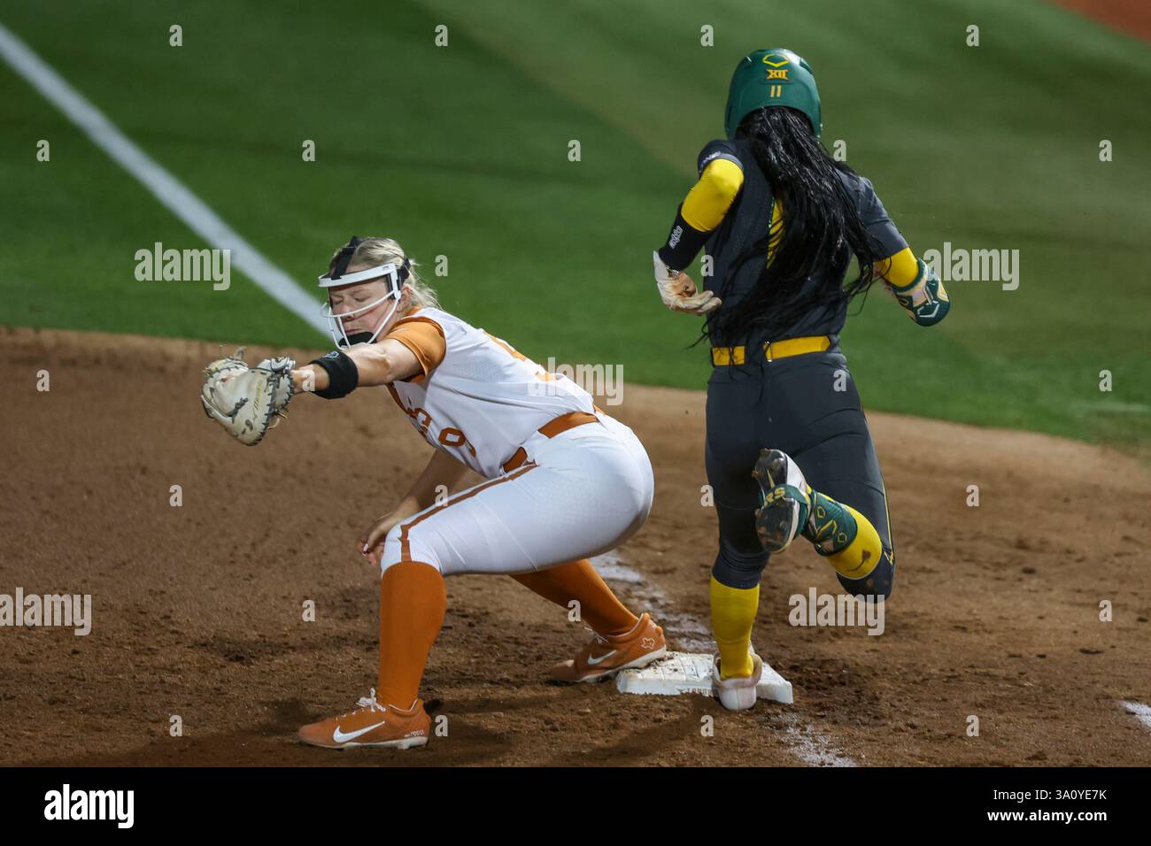 AUSTIN, TX - MARCH 05: Texas infielder Joley Mitchell (9) catches the ...