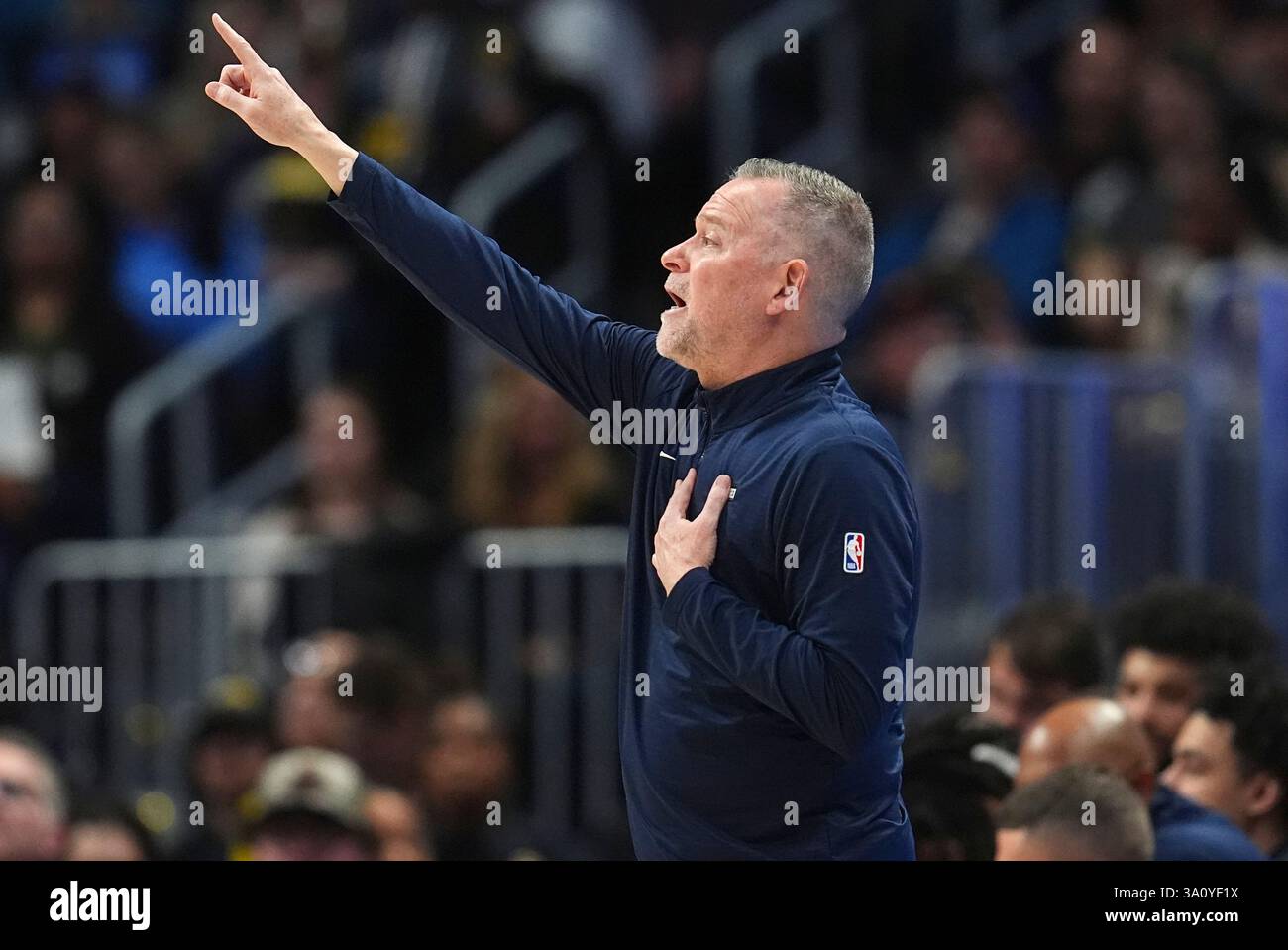Denver Nuggets head coach Michael Malone directs his team against the ...