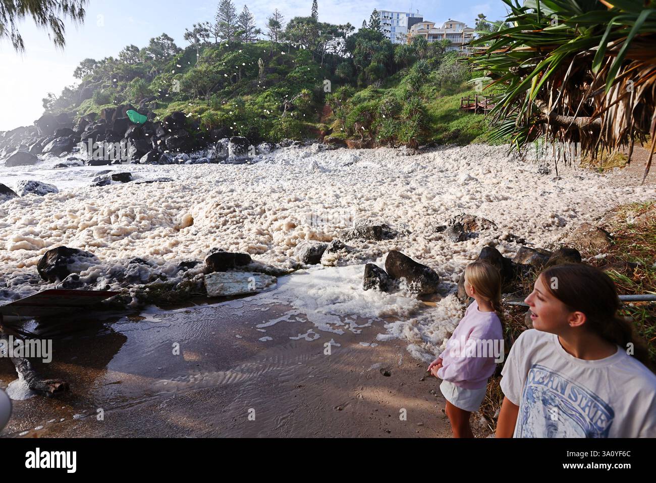 Foam is seen at Froggies beach after Big Seas from Tropical cyclone ...