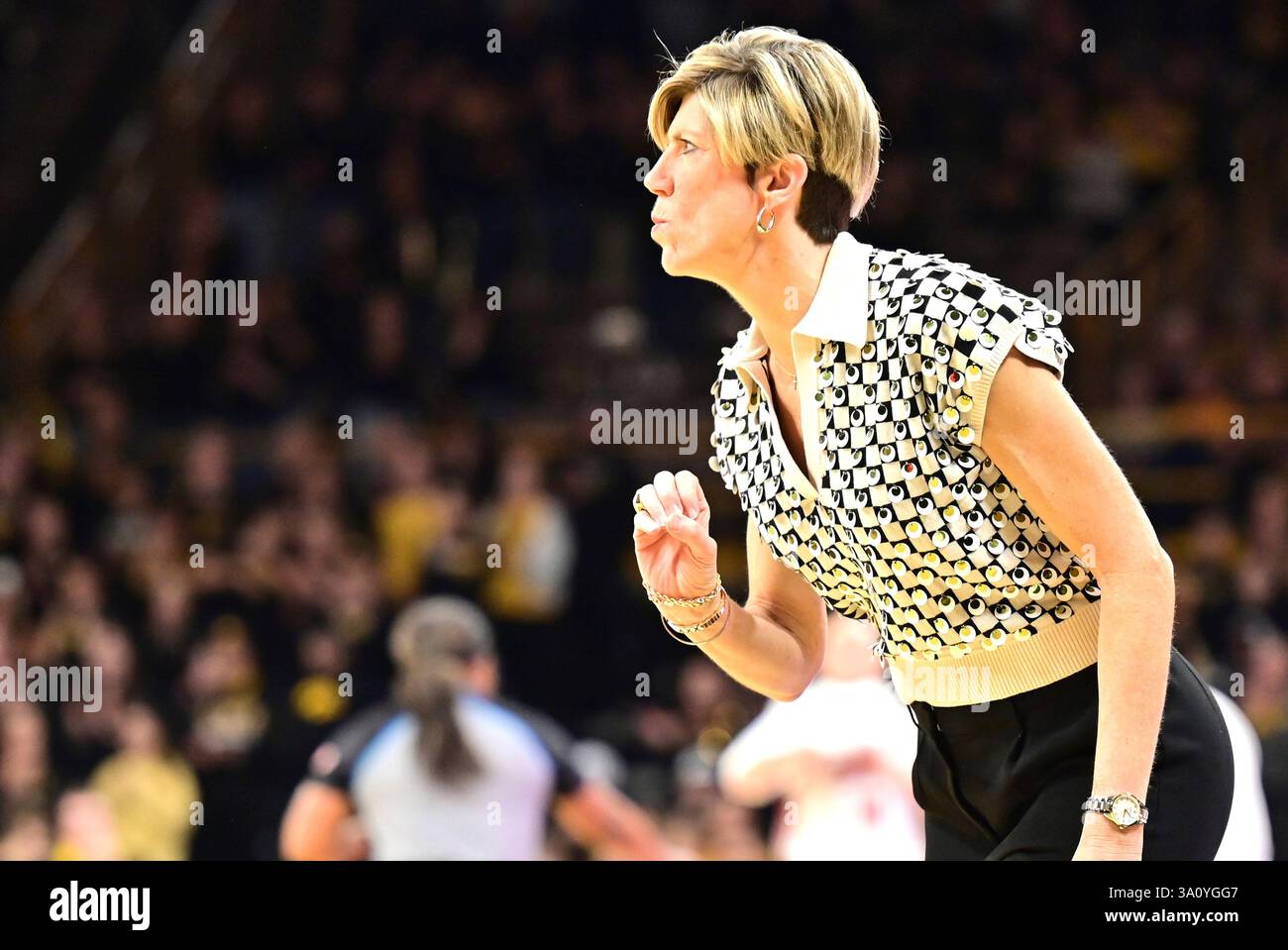 IOWA CITY, IA - MARCH 02: Iowa coach Jan Jenson encourages her team ...