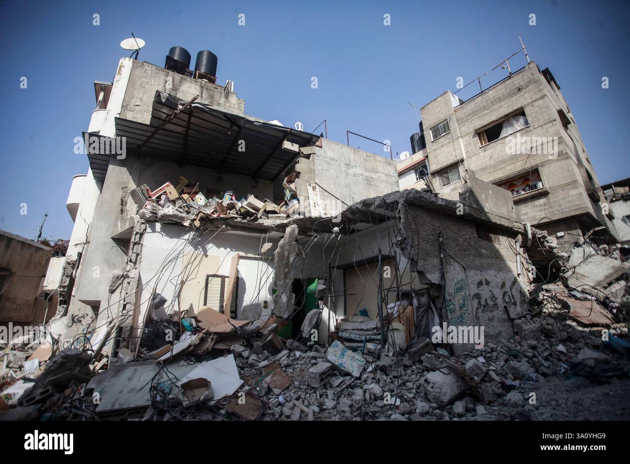 A view of destroyed buildings destroyed by Israeli army bulldozers ...