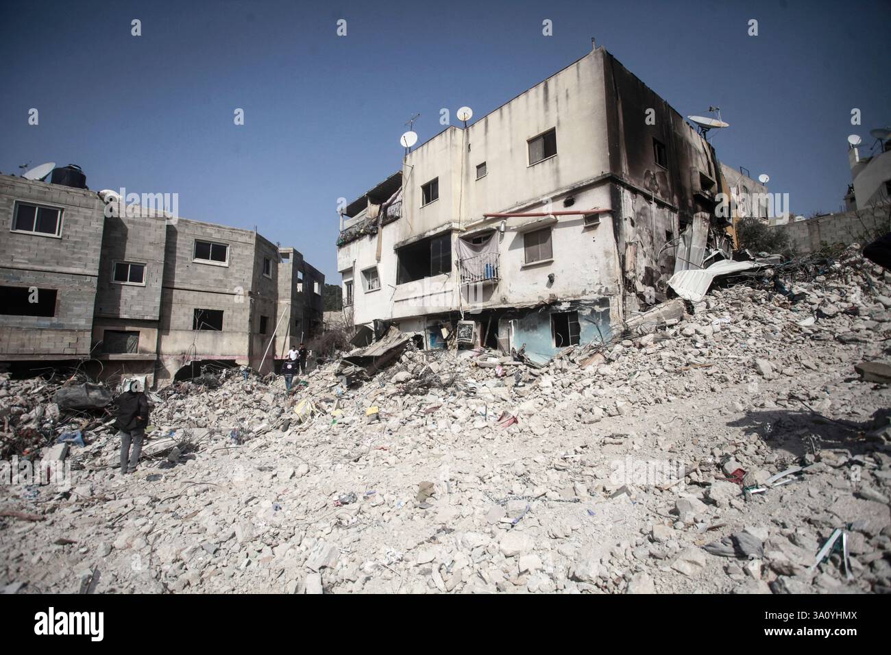 A view of destroyed buildings destroyed by Israeli army bulldozers ...
