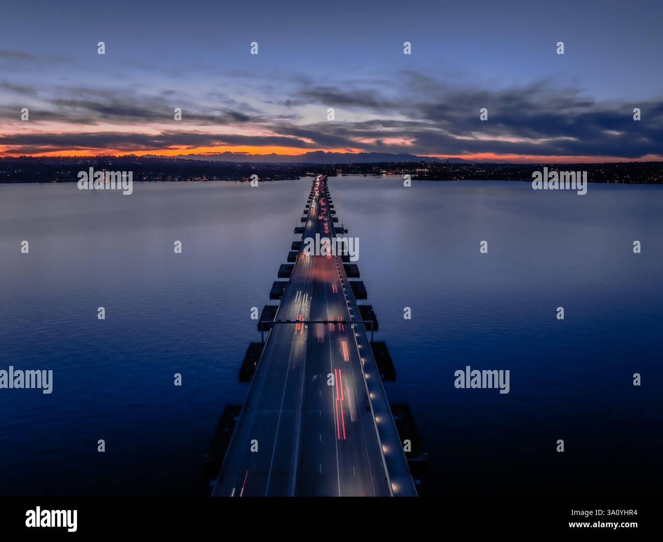 Bellevue WA USA - February 28th 2025: Peaceful dusk car lights at 520 Bridge Stock Photo - Alamy