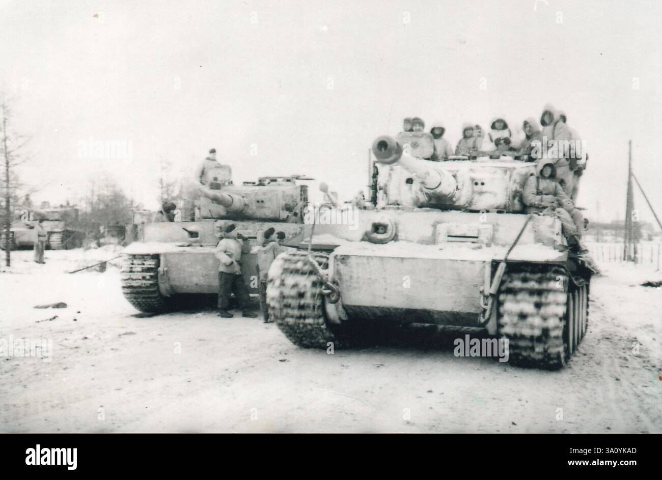 World War two B&W photo German Tiger Tanks with Snow Camo clad troops ...