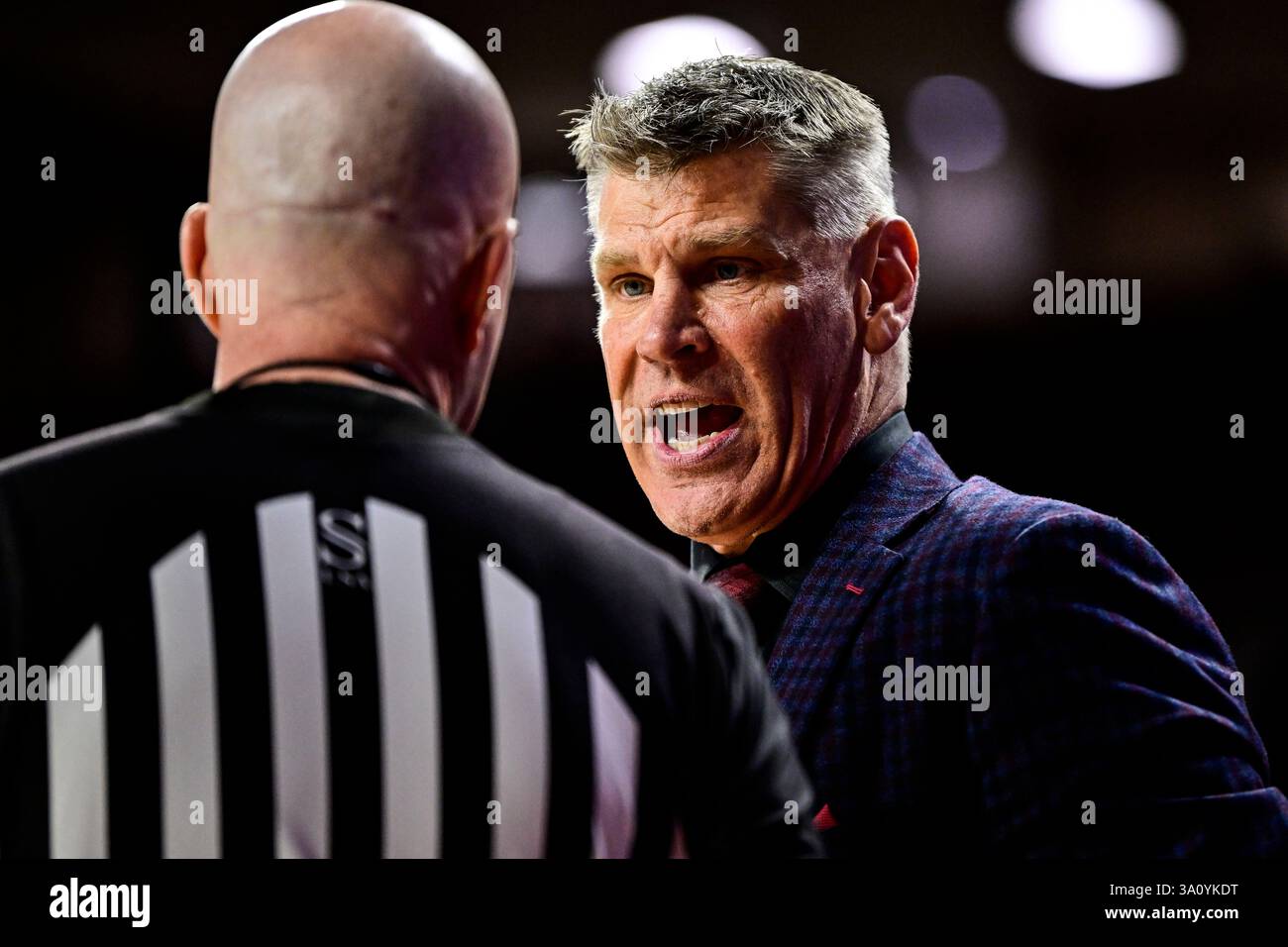 Oklahoma head coach Porter Moser speaks with referee during the second ...