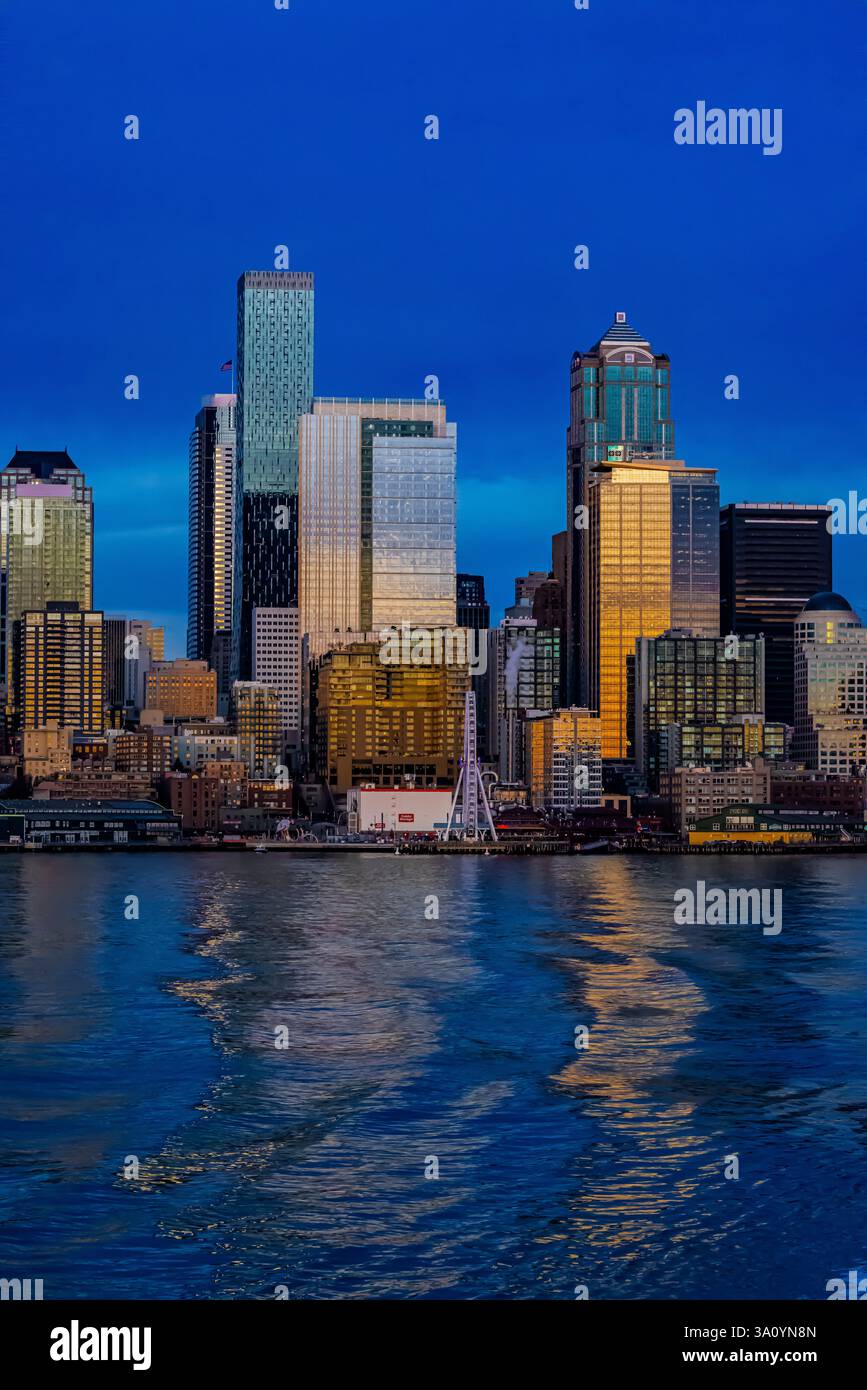 Skyline viewed near sunset from ferry leaving Colman Dock, Seattle ...