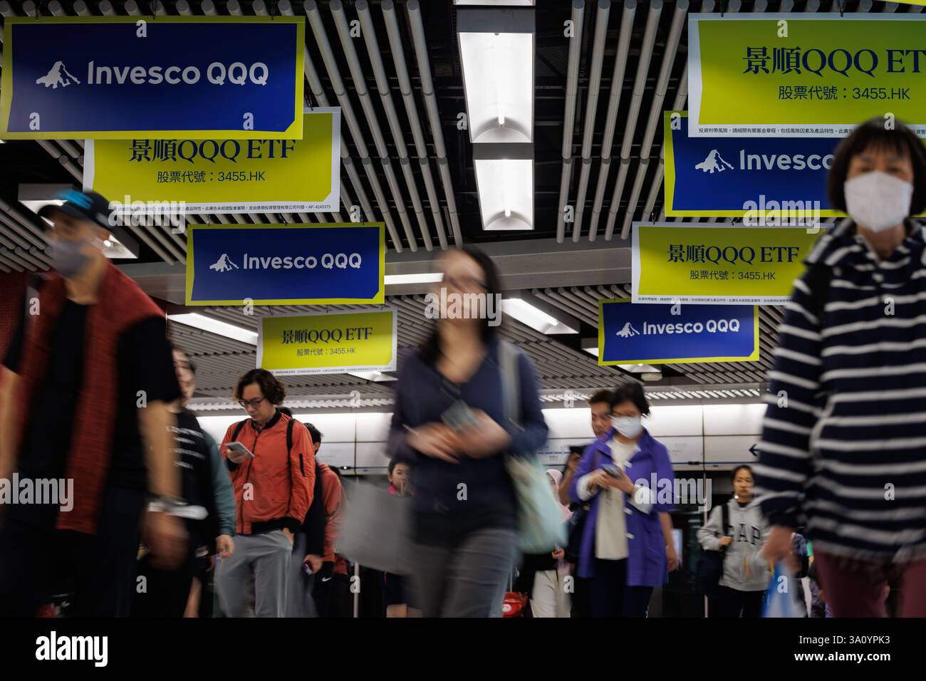 Hong Kong, China. 05th Mar, 2025. People walk under A the advertisement ...