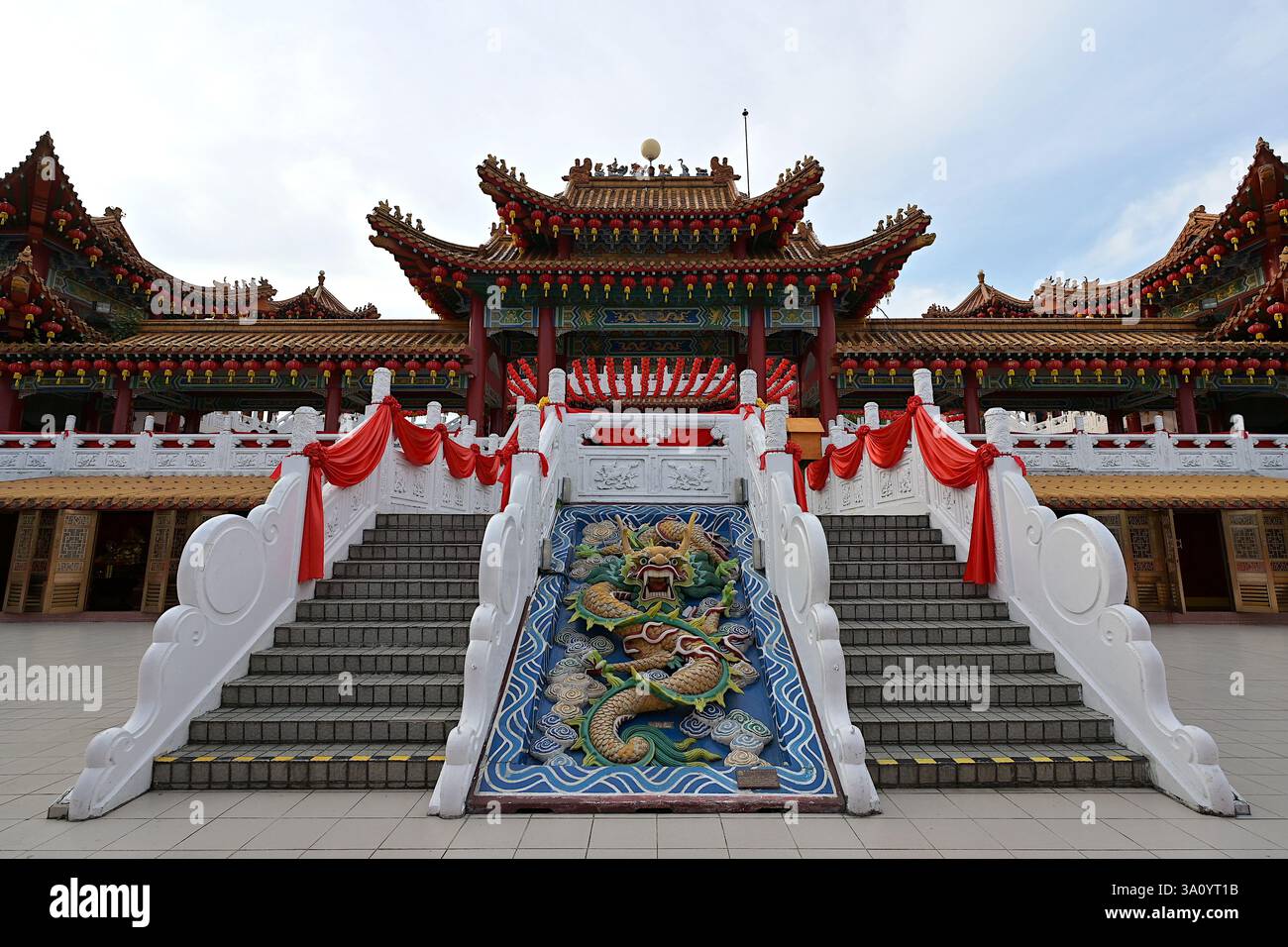 Colorful dragon sculpture along staircase leading up to the main shrine ...
