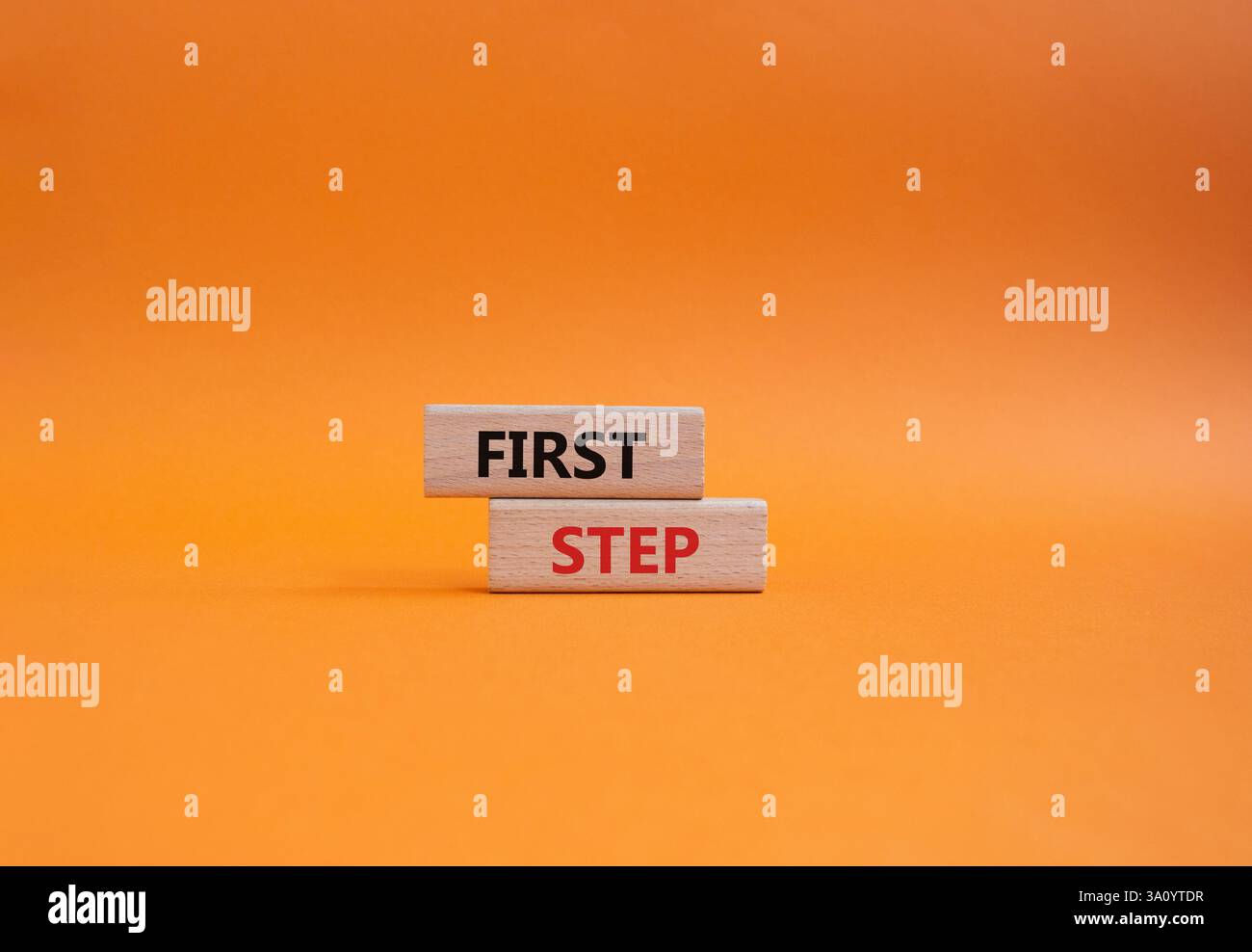 First step symbol. Wooden blocks with words First step. Beautiful ...
