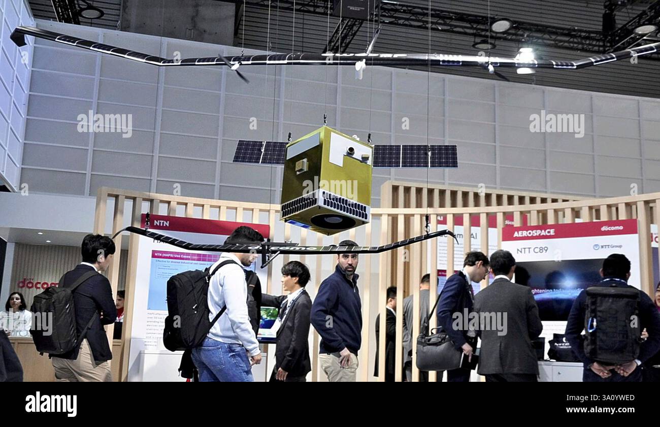 Two glider-like modesl of "flying base station" are exhibited at NTT ...