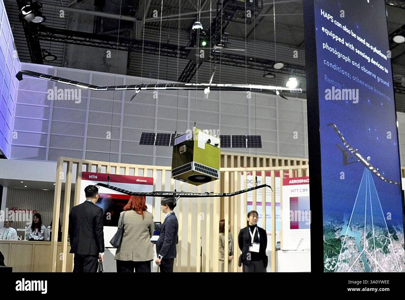 Two glider-like modesl of "flying base station" are exhibited at NTT ...