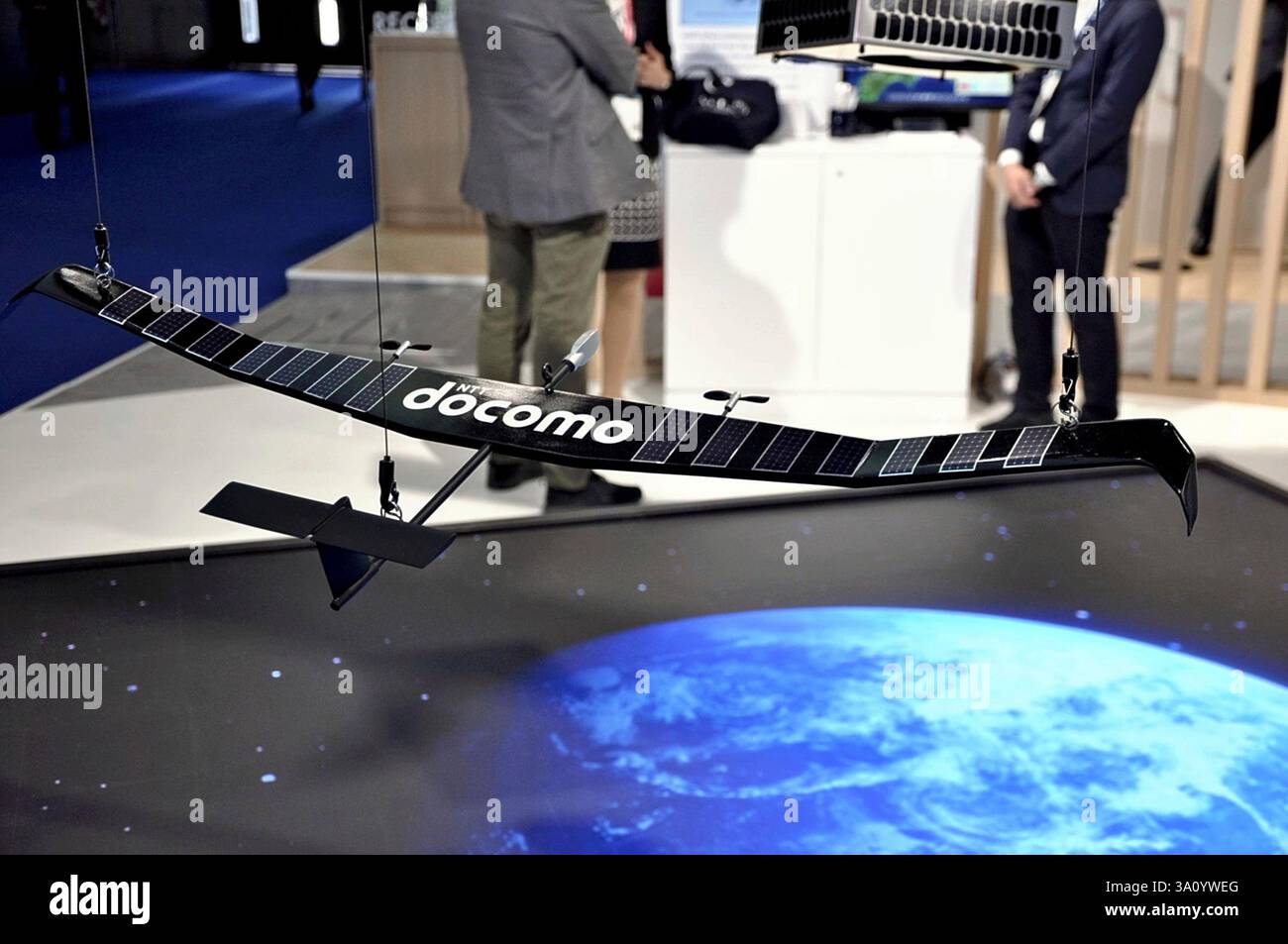 A glider-like model of "flying base station" is exhibited at NTT DOCOMO ...