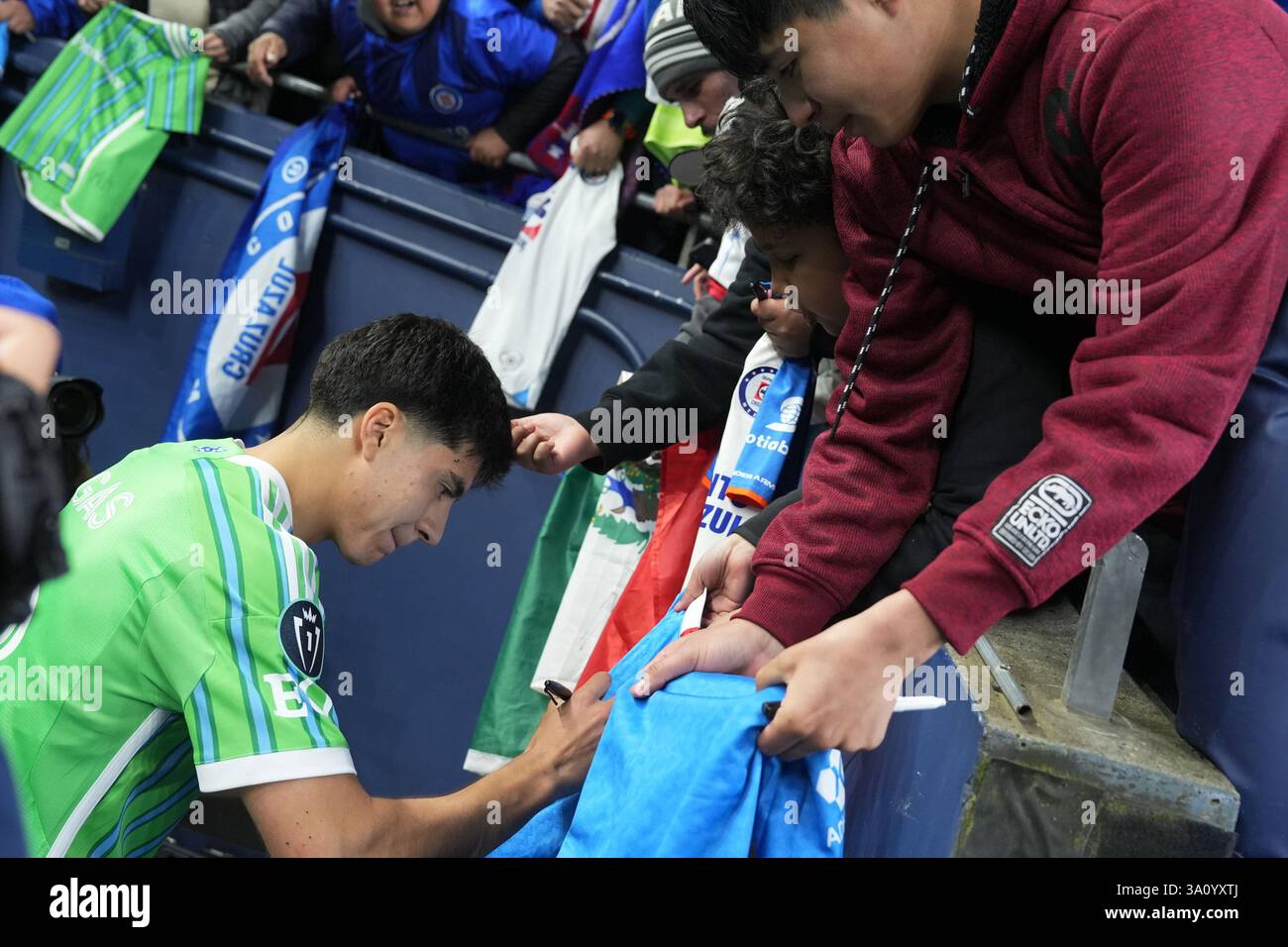 Seattle Sounders FC midfielder Obed Vargas (18) signs autographs for ...