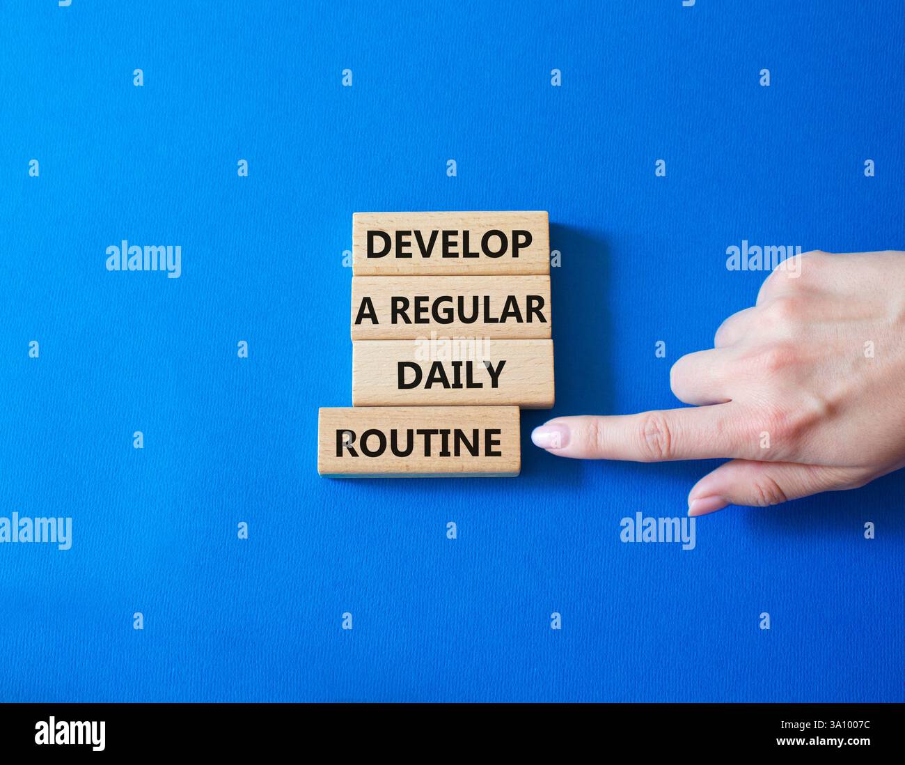 Develop a regular daily routine symbol. Concept words Develop a regular ...