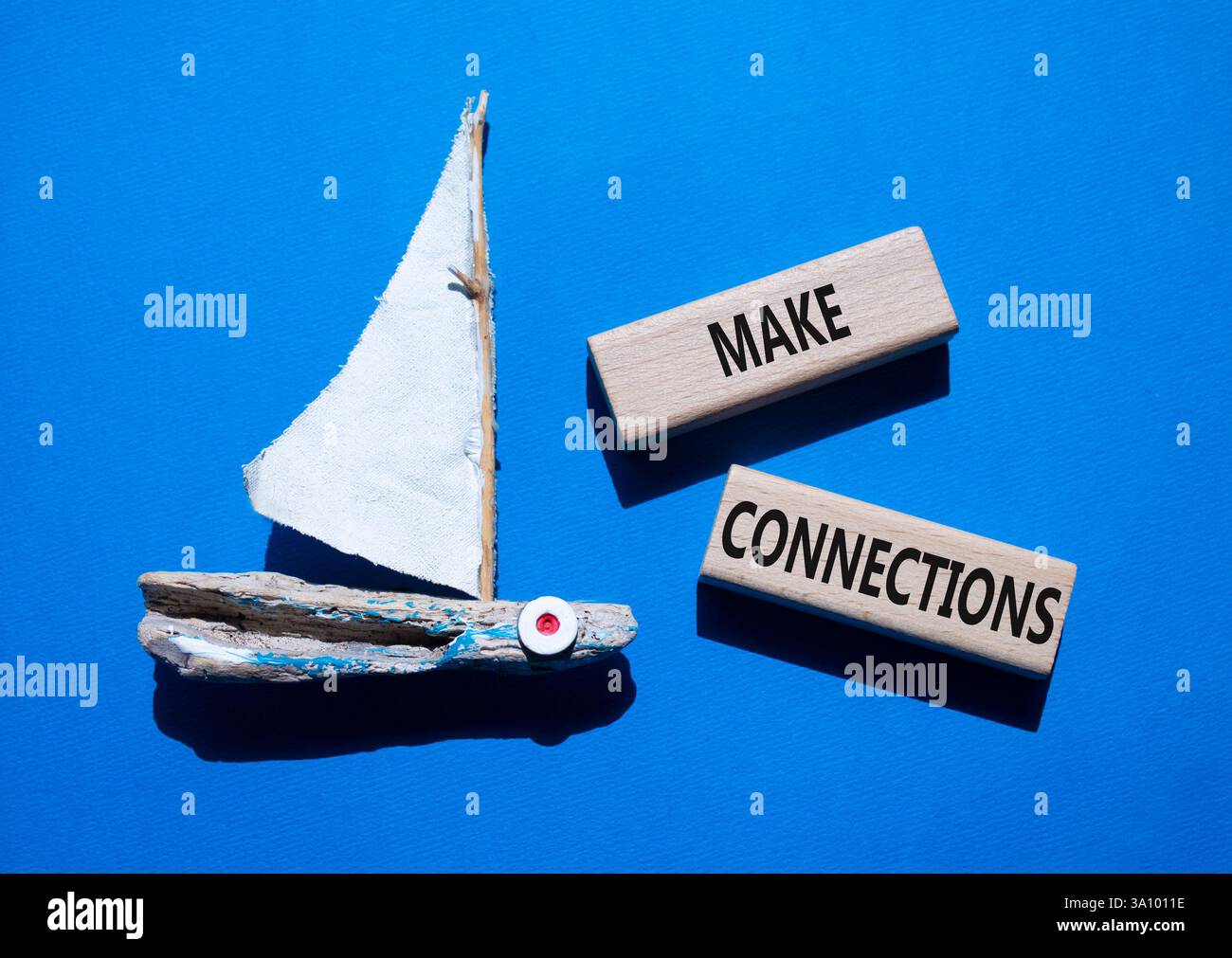 Make Connections symbol. Concept word Make Connections on wooden blocks ...