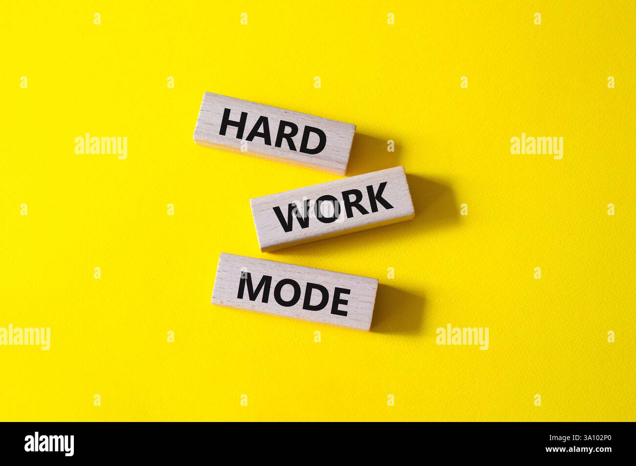Hard Work Mode symbol. Concept word Hard Work Mode on wooden blocks ...