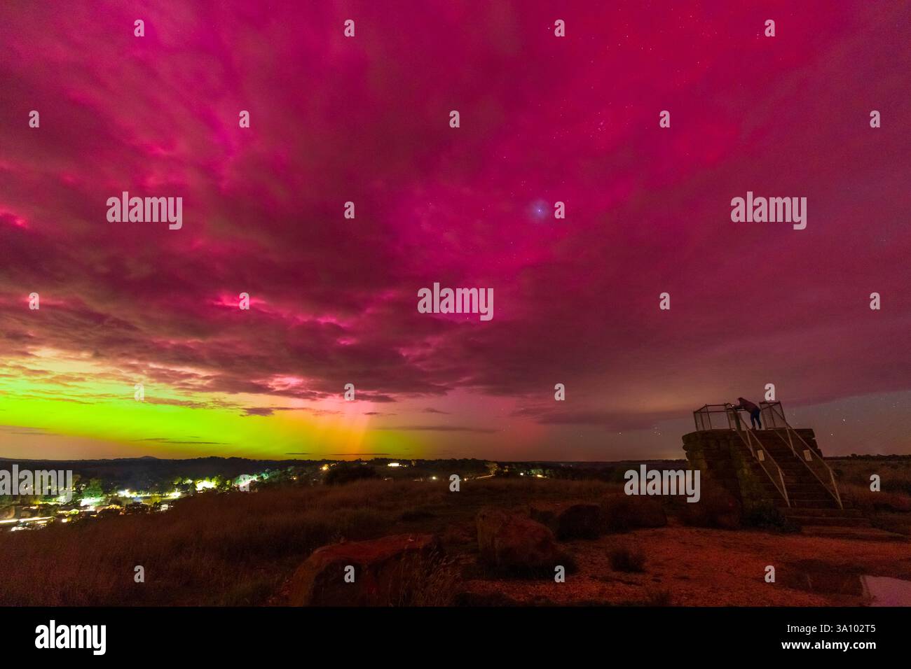 Colorful clouds and Aurora Australis over the lookout above Guildford ...