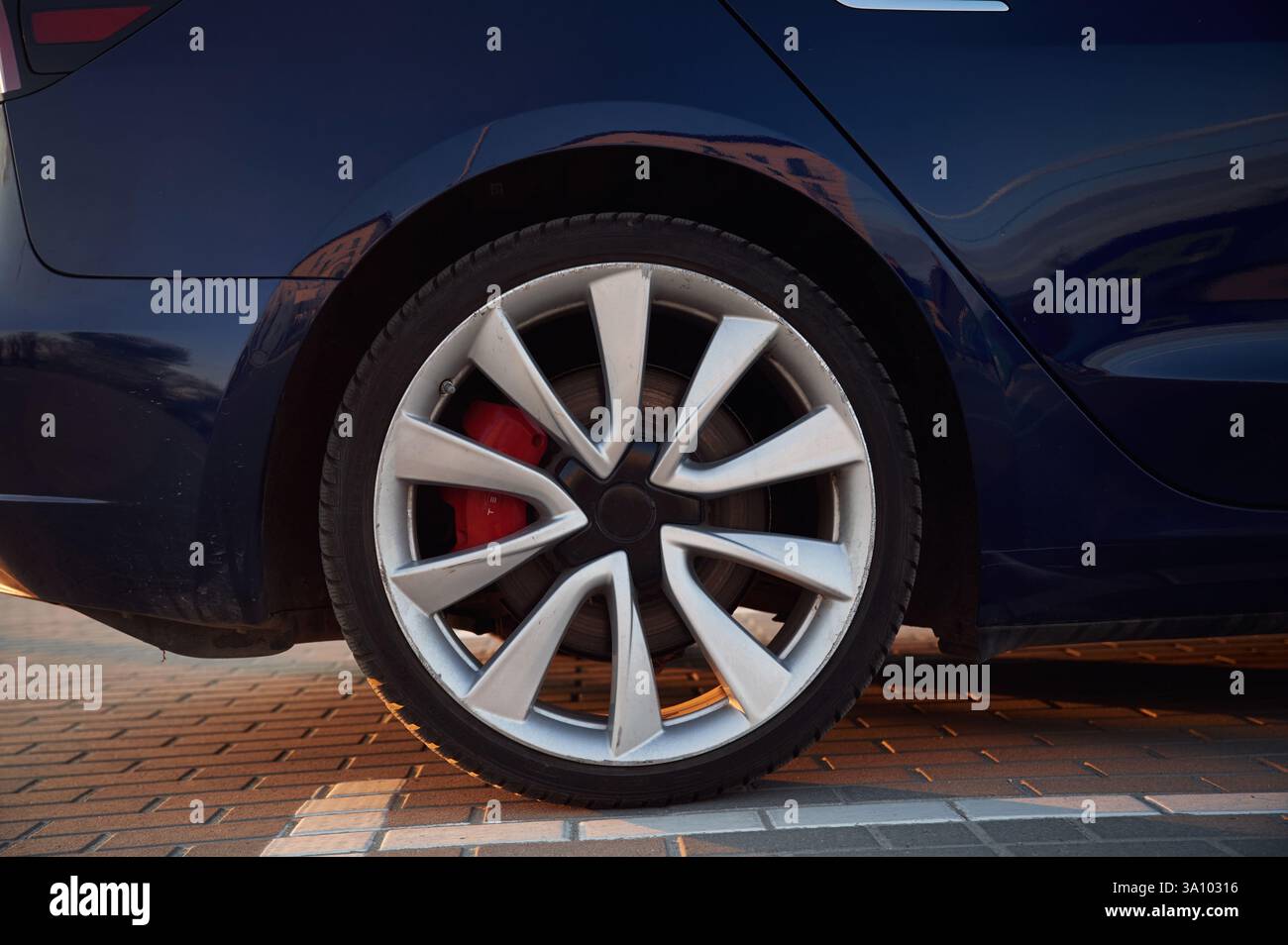 Close up side view of the rear wheel of the modern car Stock Photo - Alamy