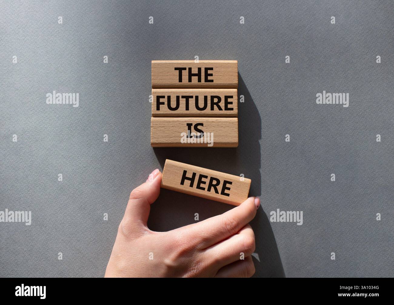 The future is here symbol. Concept words TThe future is here on wooden ...
