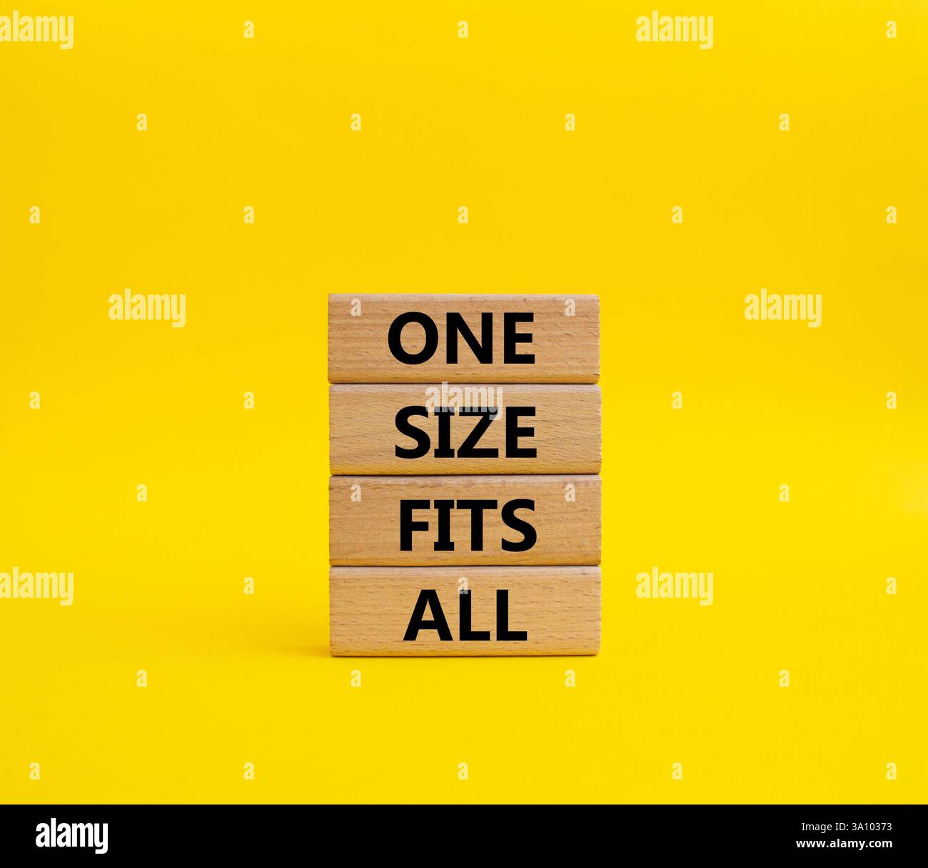 One size fits all symbol. Concept words One size fits all on wooden ...