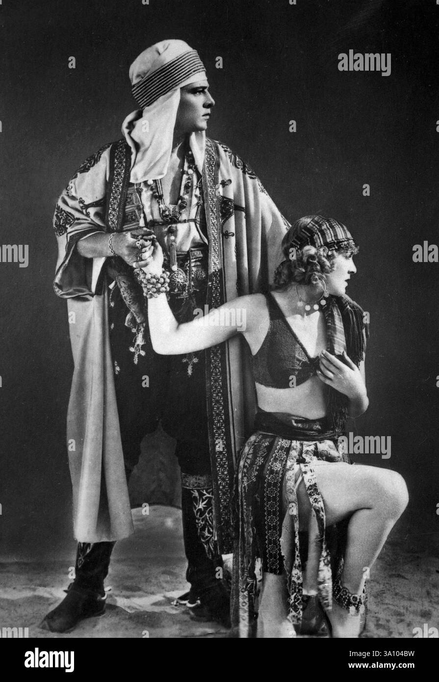 Actors Rudolph Valentino and Vilma Banky in the movie The Son of the ...
