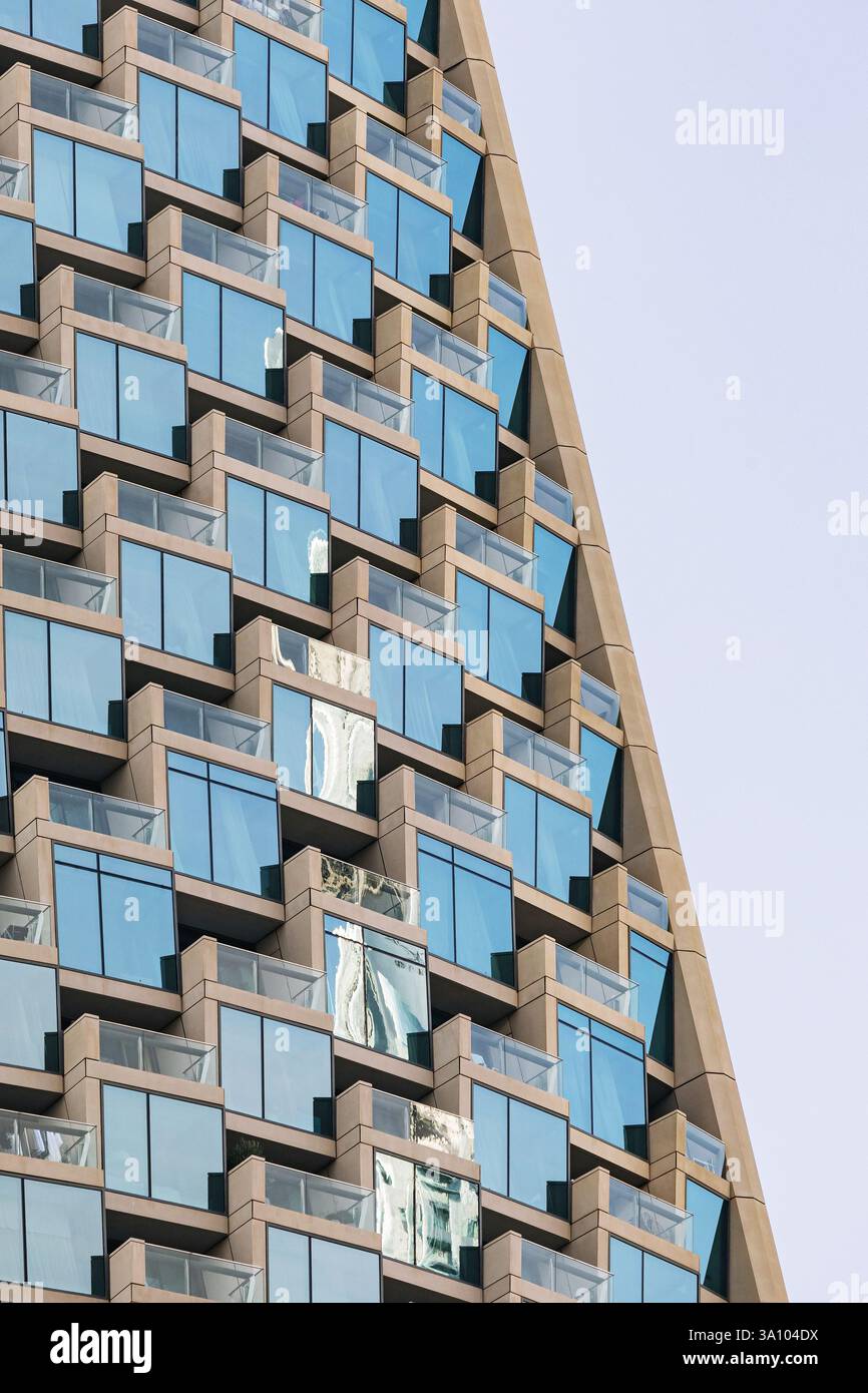 fragment of apartment building with similar floor to ceiling windows ...
