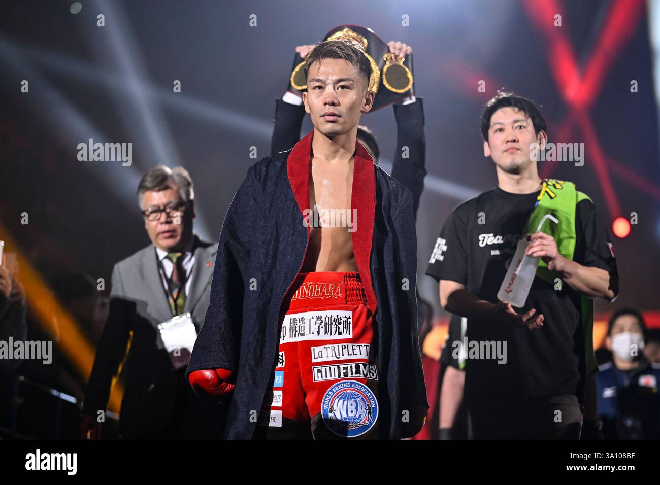 Champion Japan's Seiya Tsutsumi enters the ring before his WBA bantamweight title defense at ...