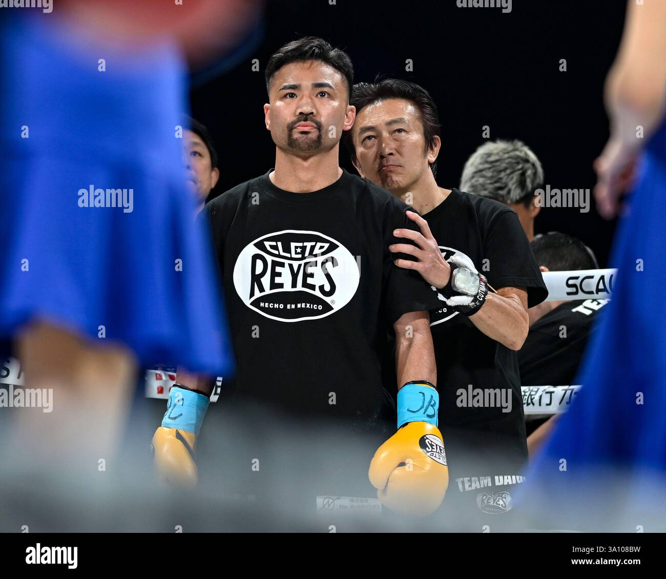 Challenger Japan's Daigo Higa, left, listens to the national anthem ...