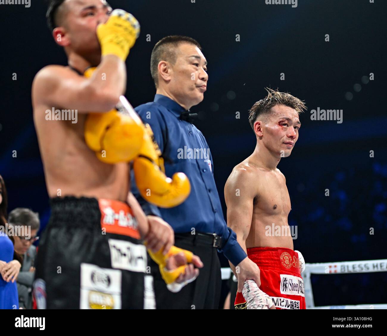 Champion Seiya Tsutsumi, right, and challenger Daigo Higa, left, listen ...