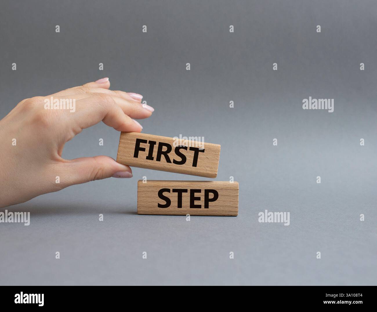 First step symbol. Wooden blocks with words 'First step'. Beautiful ...