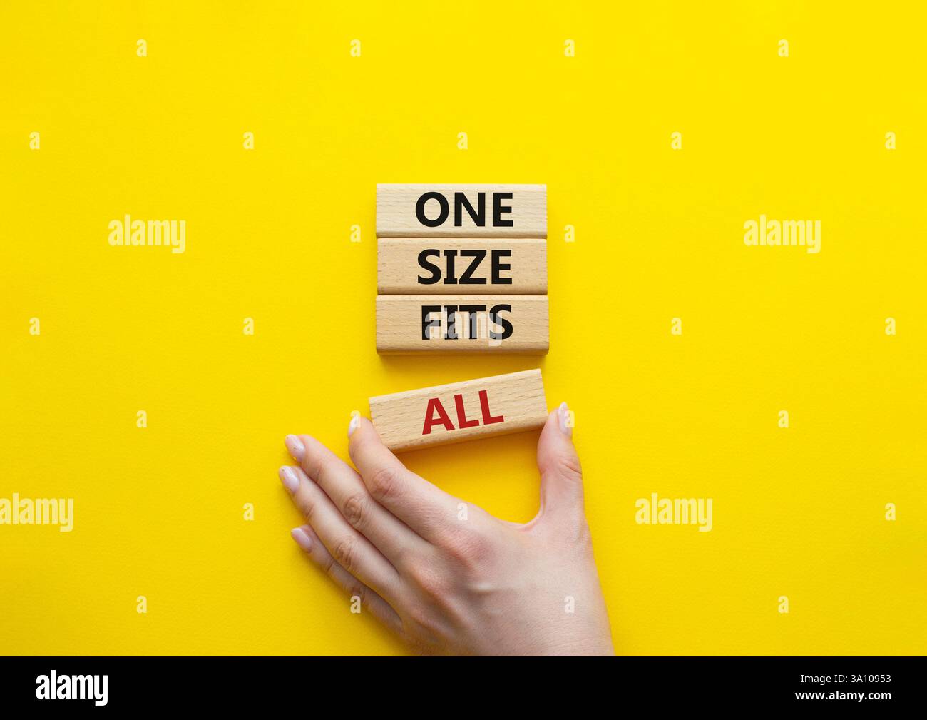 One size fits all symbol. Concept words One size fits all on wooden ...
