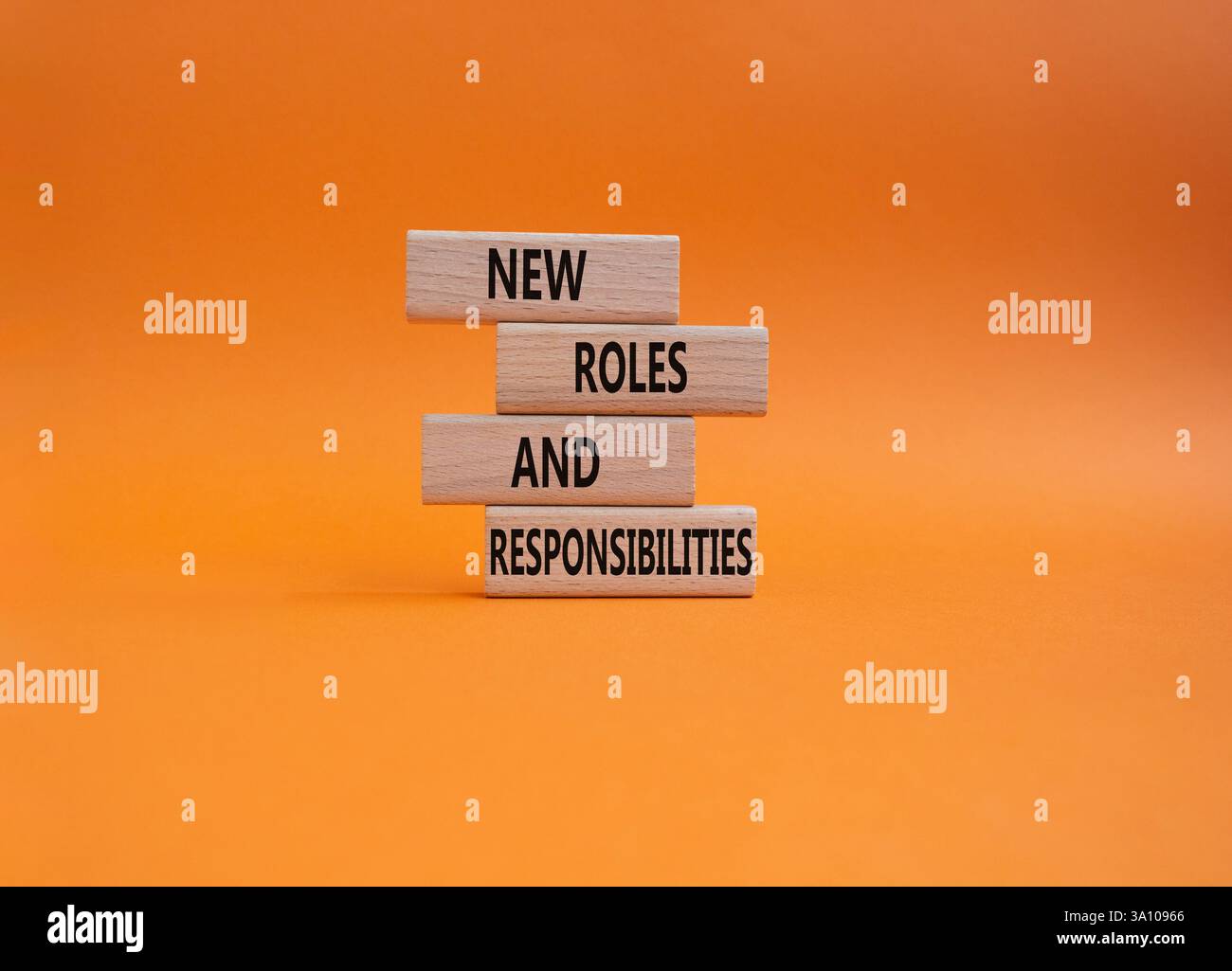 New roles and responsibilities symbol. Wooden blocks with words New ...
