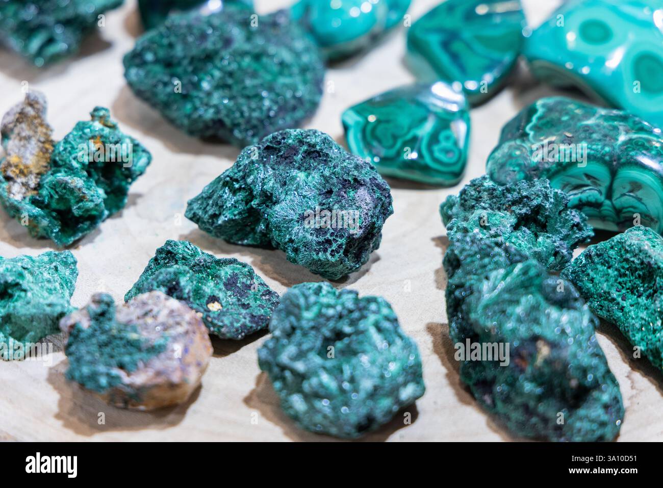 Unprocessed and polished malachite minerals with vibrant green colors ...