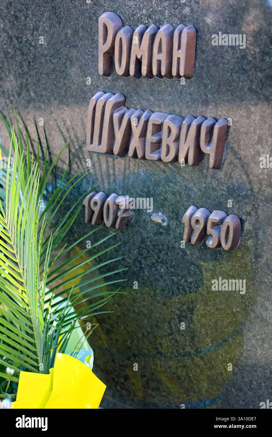 The monument to Roman Shukhevych is pictured during the gathering to ...