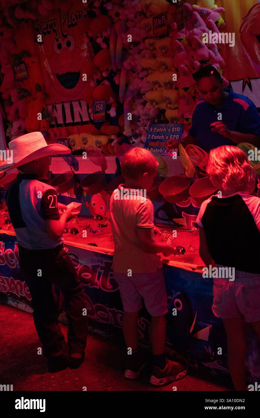 Crowd having fun in side show alley, 2025 Allora Show Stock Photo - Alamy