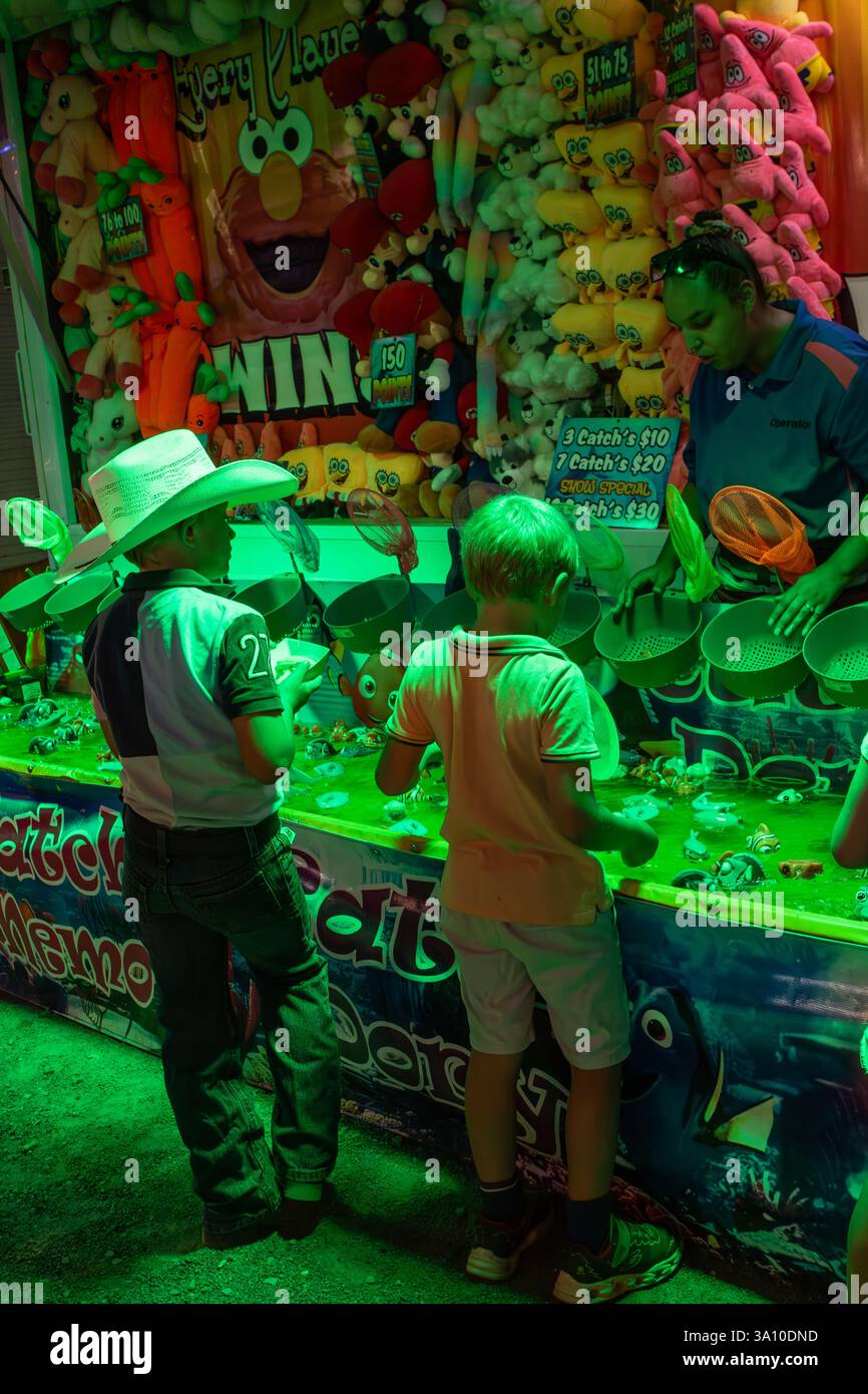 Crowd having fun in side show alley, 2025 Allora Show Stock Photo - Alamy