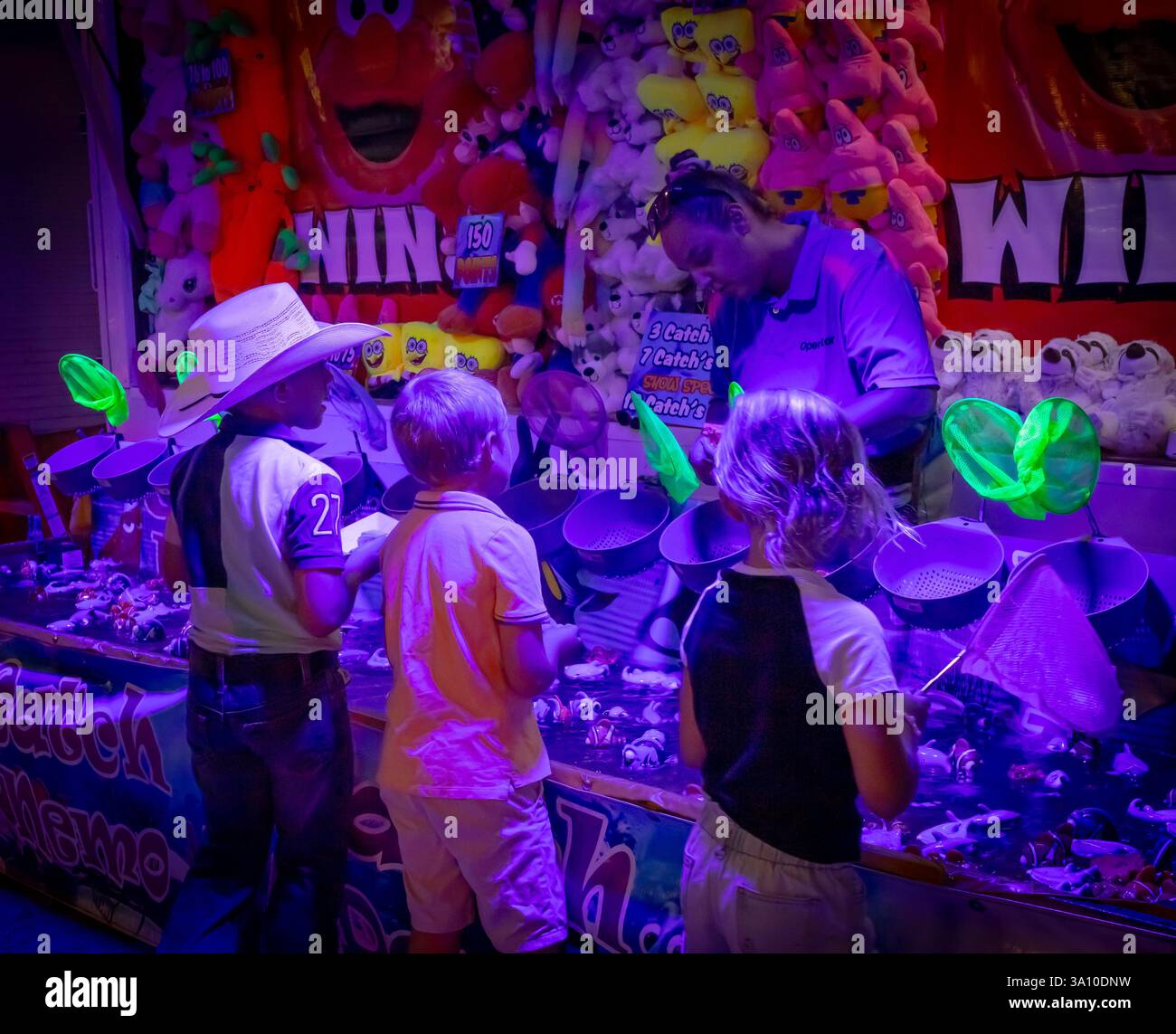 Crowd having fun in side show alley, 2025 Allora Show Stock Photo - Alamy