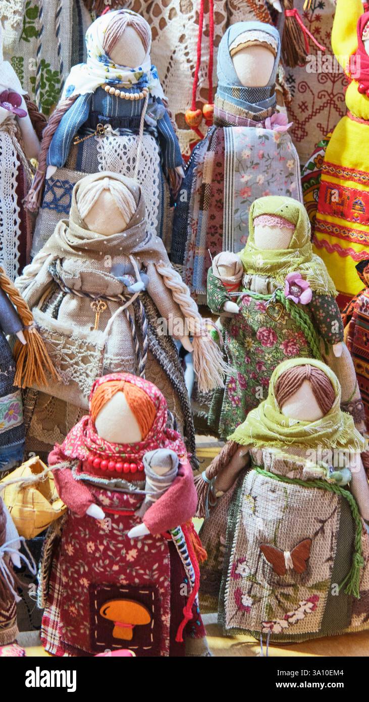Collection of handmade Slavic textile dolls, crafted with intricate ...