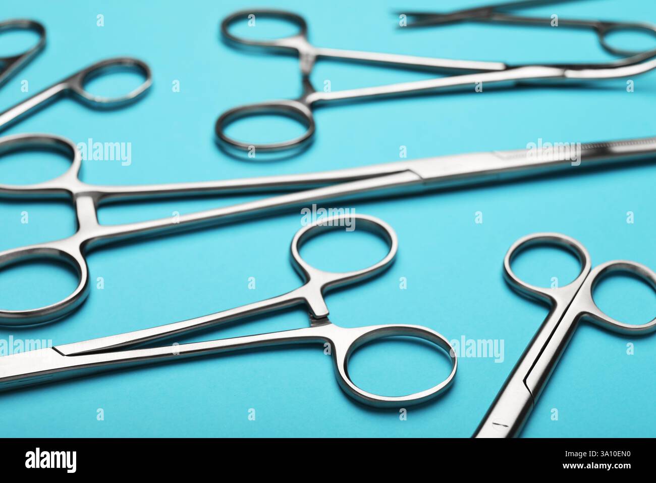 Different surgical tools on light blue background, closeup Stock Photo ...