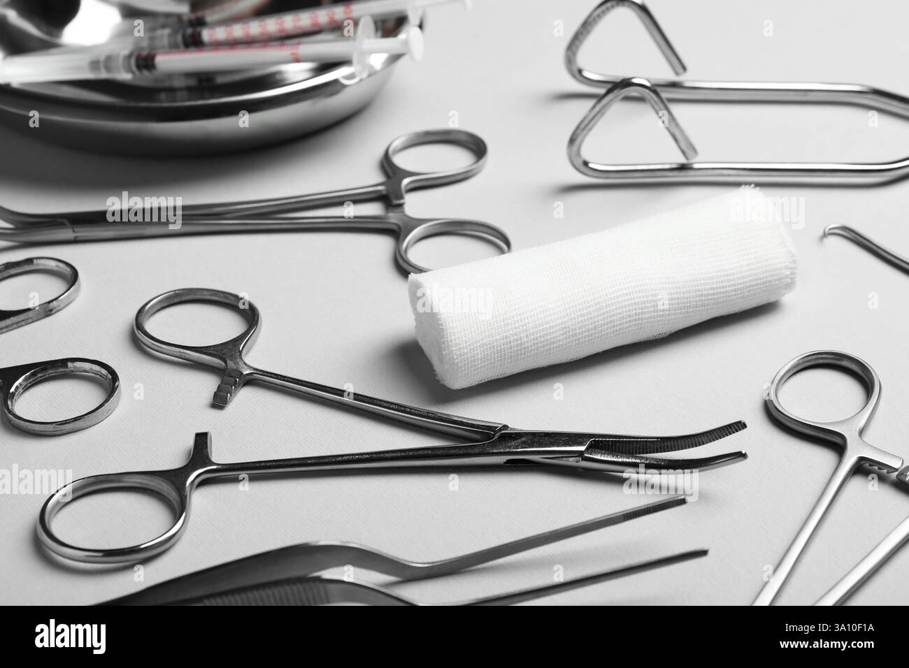 Different surgical instruments on light grey background, closeup Stock ...