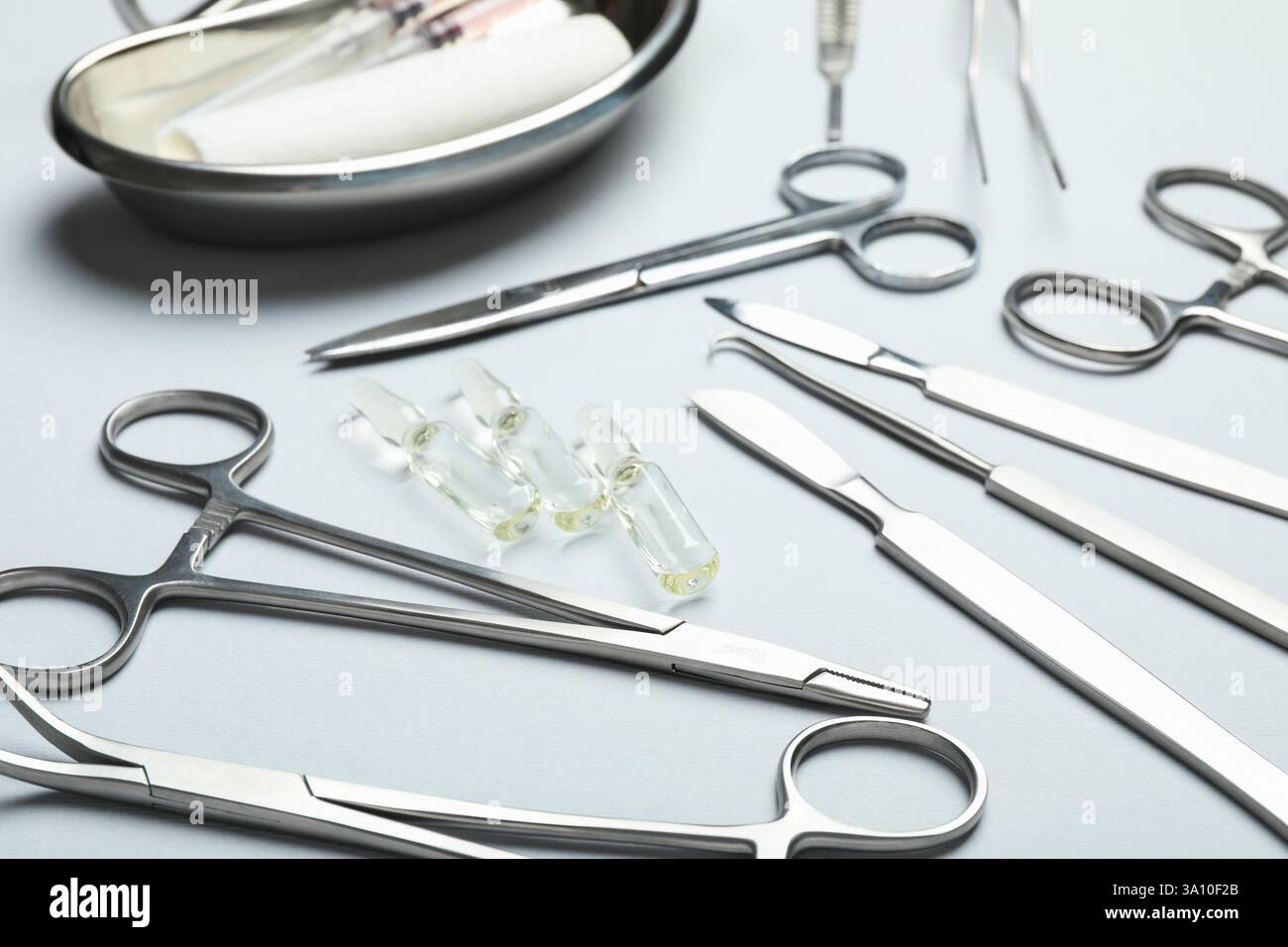 Different surgical instruments on light grey background, closeup Stock ...