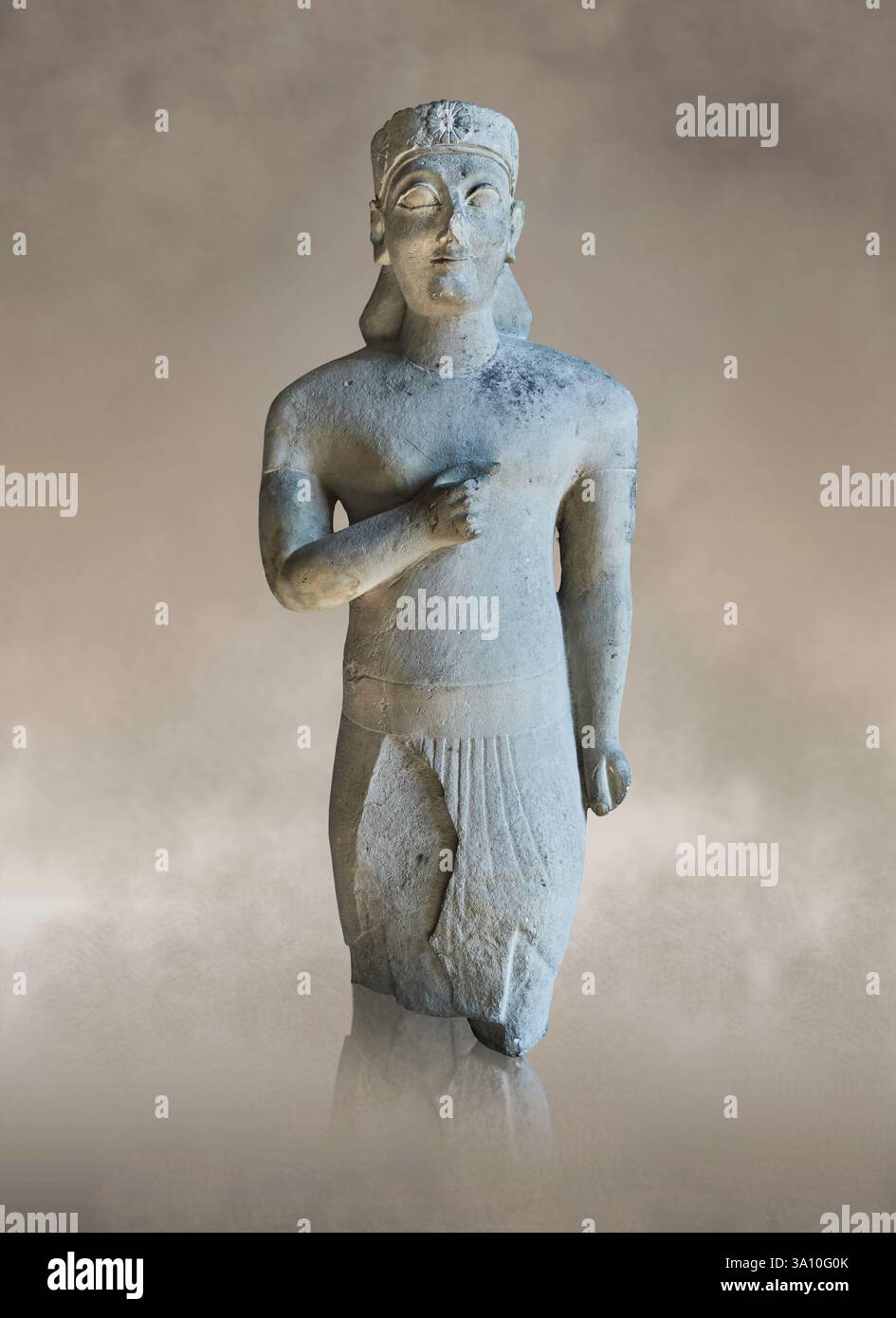 Ancient Greek Cypriot statue of a male with a rosette diadem. The style ...