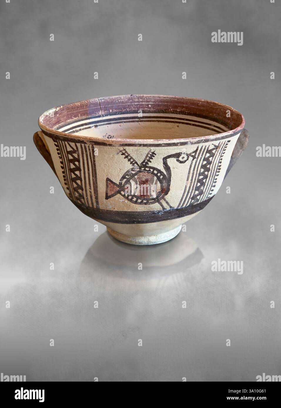 Ancient Greek Cypriot geometric pottery cup with a dark painted bird ...