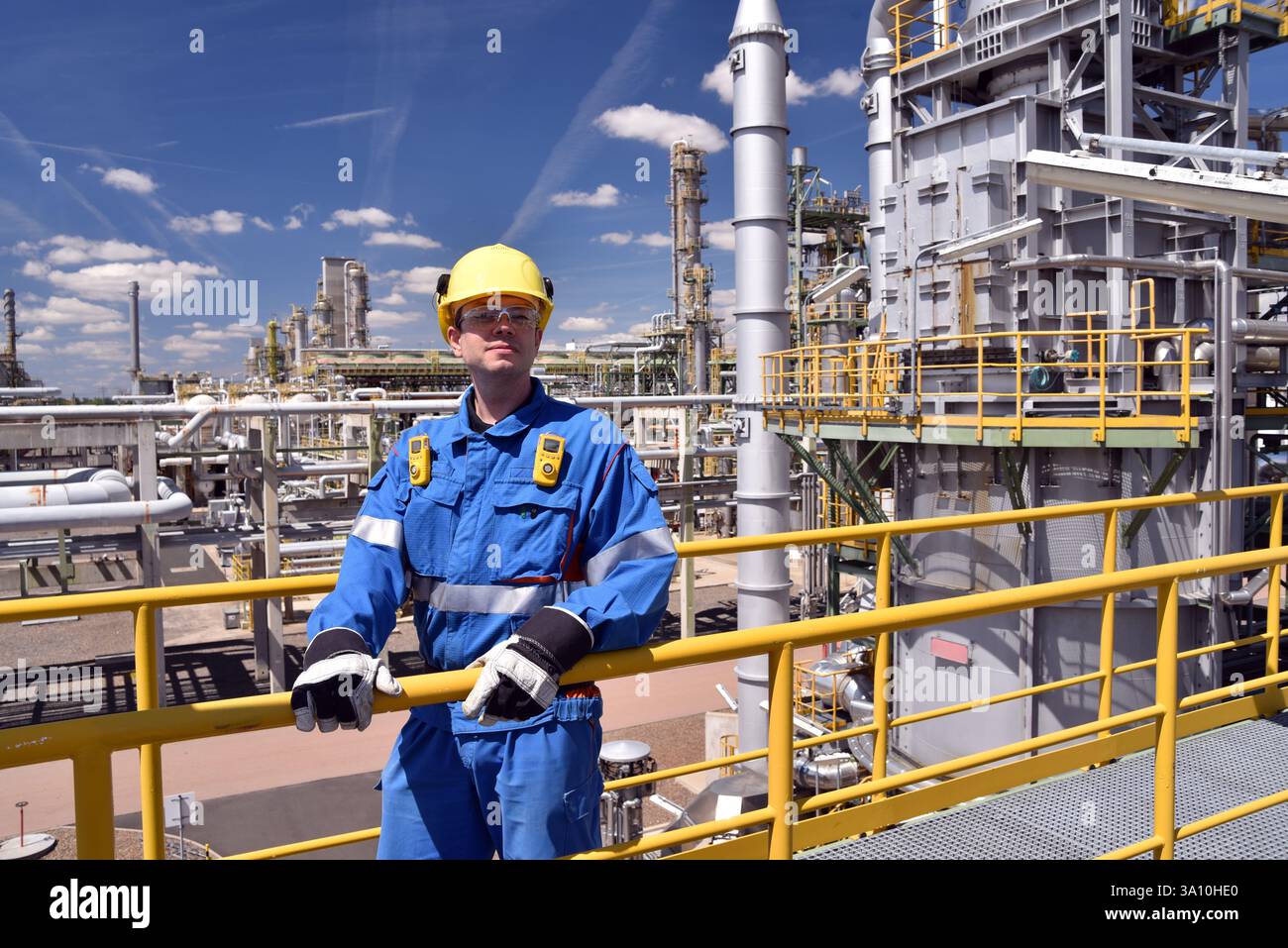 group of workers professional equipment in a petroleum refinery ...