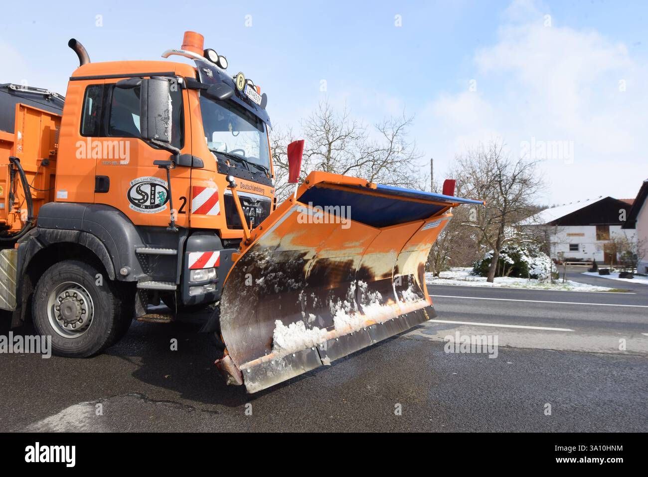 snowplow on country road, snow clearing vehicle in winter service snow ...