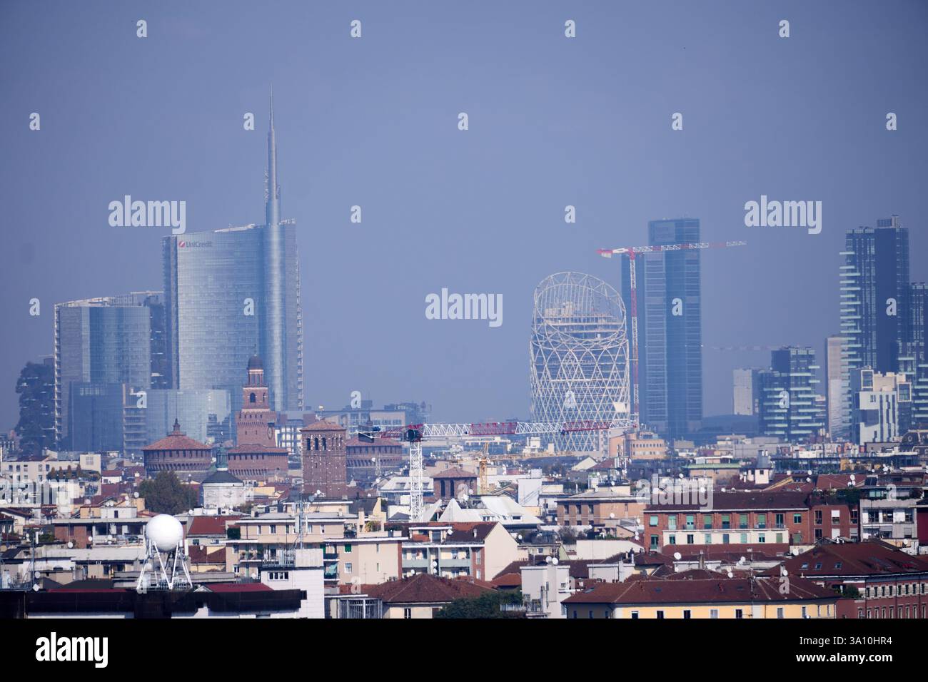 An aerial view of Milan skyline with many buildings in Italy Stock ...