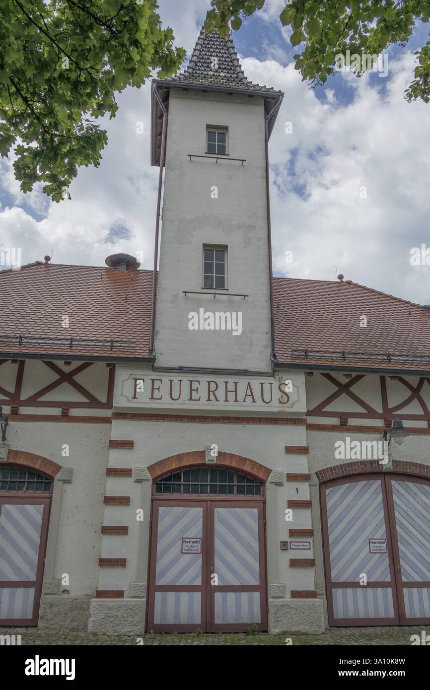 Detailed view of a historic fire station with decorative facade and ...